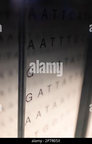 Capital letter code matrix written on different translucent glass ...