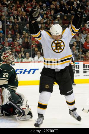 Boston Bruins' Byron Bitz, left, battles New York Islanders' Richard ...