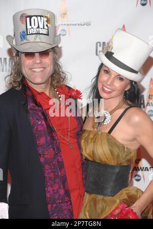 Country artist Big Kenny Alphin and wife Christiev Carothers attend the ...