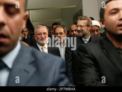 Iraqi Parliament speaker Ayad al-Samarai, right, speaks next to his ...