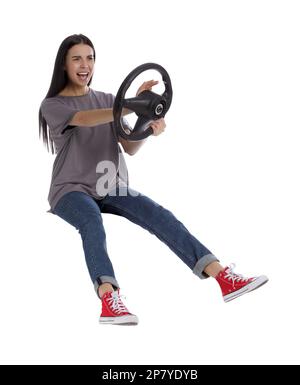 Angry woman on stool with steering wheel against white background Stock ...