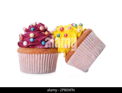Two failed cupcakes with cream on white background. Troubles happen ...