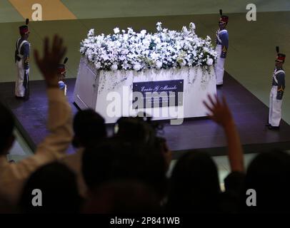 Members of the Iglesia ni Cristo, or Church of Christ, observe as their ...