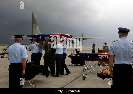 Royal Australian Air Force members take their breaks from work to watch ...
