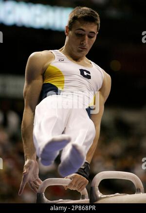 Tim McNeill of the U.S. performs on the floor during men's qualifying ...