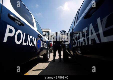 Baja California North State Police officers stand next to their new ...