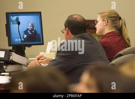 Morgan Amanda Leppert, right, sits with her attorney Christopher Smith ...