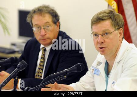 Barry Feldman, left, a family friend and spokesman for U.S. Rep John ...