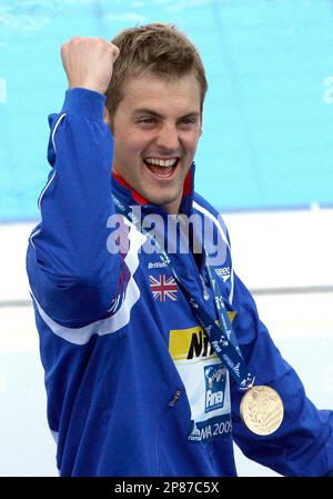 Britain's Liam Tancock reacts after winning the gold medal of the Men's ...