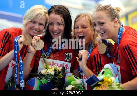 From left, Germany's Britta Steffen, Annika Mehlhorn, Sarah Poewe and ...