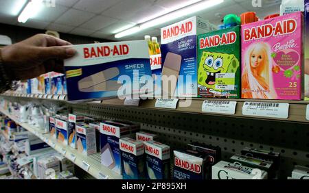 Band-Aid products on display at a Walgreens Flagship store Stock Photo ...