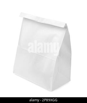 Closed paper grocery bag isolated on white Stock Photo - Alamy