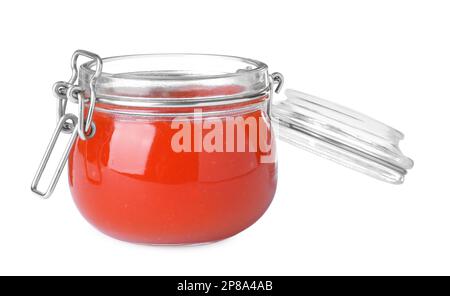 Delicious rowan jam in glass jar and berries with green leaves on white ...