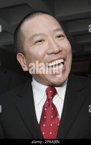 Feng shui adviser Tony Chan Chun-chuen, center, appears in a Hong Kong ...