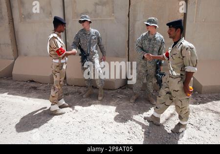 American soldiers of the First Army shake hands with Russian ...