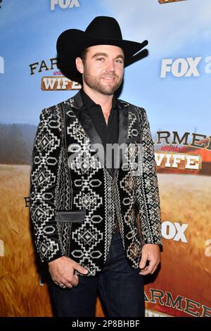 Hunter Grayson attends the premiere FOX television's "Farmer Wants a ...