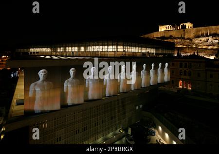 Photos of the so-called Kritios Boy statue are projected onto the walls ...