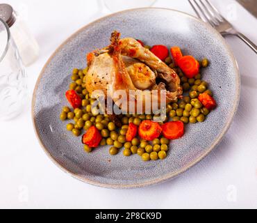 Popular Spanish dish is baked quail Stock Photo - Alamy