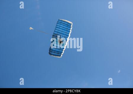 two-person parachute descent seen from below Stock Photo - Alamy