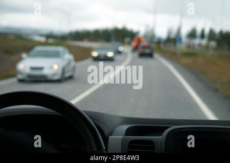 Driving a car - perspective of a driver - bokeh effect Stock Photo - Alamy