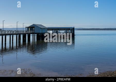 Early-morning view of Victoria Point Jetty, with calm seas and Bay ...