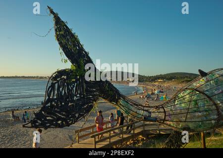 Whale made of wires to encourage plastic recycling on beach near ...