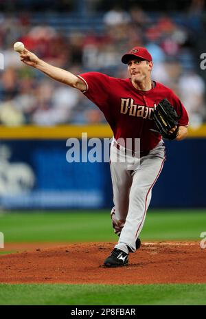 Arizona Diamondbacks starting pitcher Max Scherzer turns to make a ...