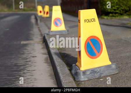 police traffic cones on the pavement to stop people parking when ...