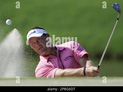 Alex Cejka blasts from the bunker on the 8th hole during the second ...