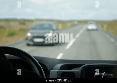 Driving a car - perspective of a driver - bokeh effect Stock Photo - Alamy