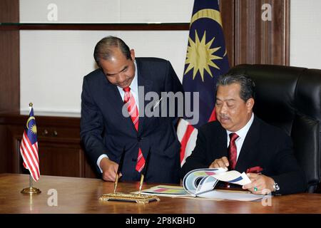 Malaysian Chief Secretary to the Government Mohd Zuki Ali walks during ...