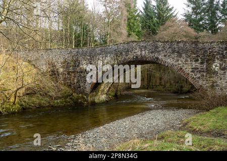 Old Manor Bridge spanning the Manor Water near Peebles in the Scottish ...