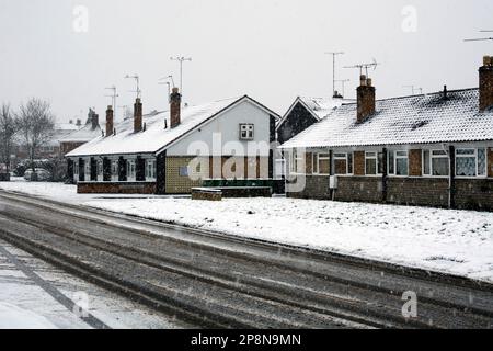 Elderly people`s bungalows in snowy weather, Warwick, Warwickshire, UK ...