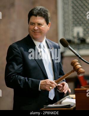 House Speaker Greg Stumbo, D-Prestonsburg, whispers to Rep. Fred Nesler ...