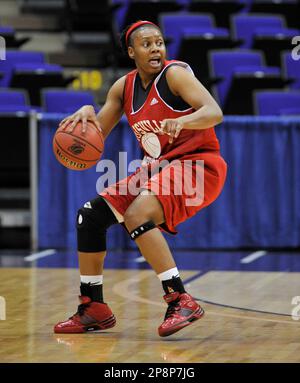 Louisville forward Deseree' Byrd (50) cheers her team on against ...