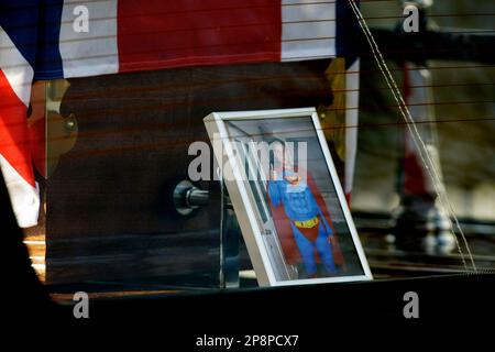 The coffin of Sapper Patrick Azimkar, 21, is carried during his funeral ...