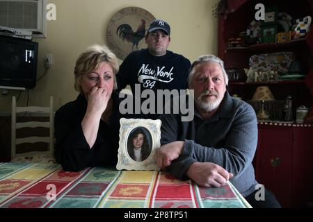 Victoria Tinyes, left, her husband Richard Tinyes, and their son ...