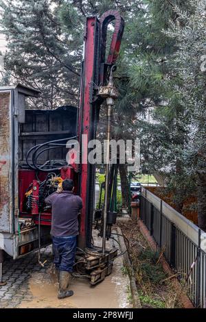 Self-propelled Mini drill rig drills soil for soil investigation. Test ...