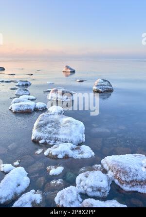 frozen snow covered beach by the sea in harsh winter Stock Photo - Alamy