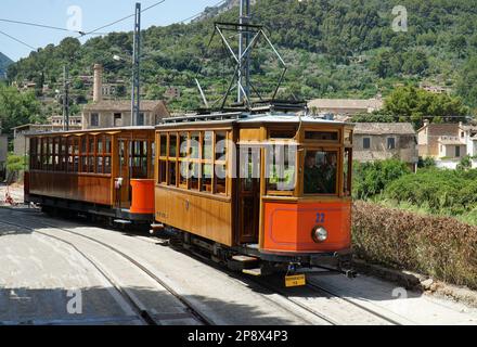 Tram at Soller station with hills in background Stock Photo - Alamy