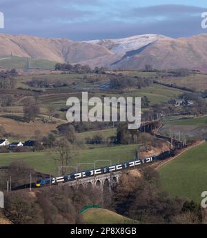 With the Howgills behind an Avanti West Coast Alstom Pendolino train ...