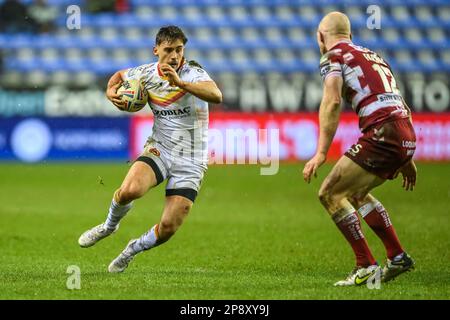Arthur Mourgue #1 of Catalans Dragons is tackled by Ethan Havard #16 of ...