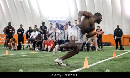Texas defensive lineman Moro Ojomo runs a drill at the NFL football ...