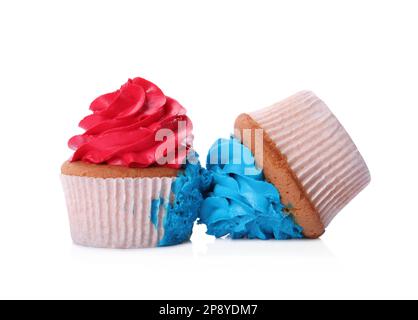 Two failed cupcakes with cream on white background. Troubles happen ...