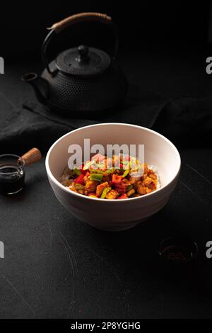 Chinese gong bao chicken with rice and peanuts Stock Photo - Alamy