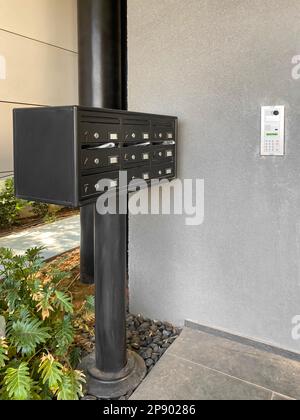 Mailboxes for letters and correspondence. Modern black mailboxes with ...