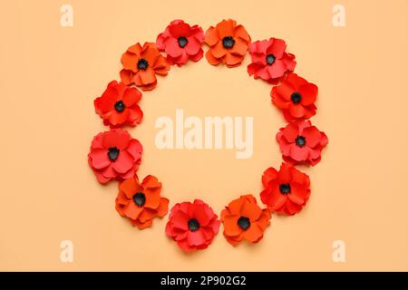 Frame made of paper poppy flowers with leaves on beige background Stock ...