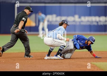 Toronto Blue Jays' Davis Schneider warms up prior to Game 3 of baseball ...