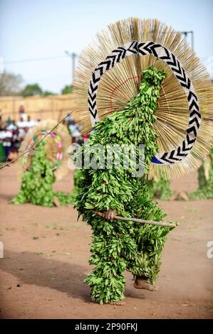 Leaf masks at Festima Festival in Dedougou, Burkina Faso Stock Photo ...