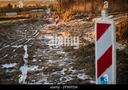 Frozen ruts on a renovated section of city roads Stock Photo - Alamy